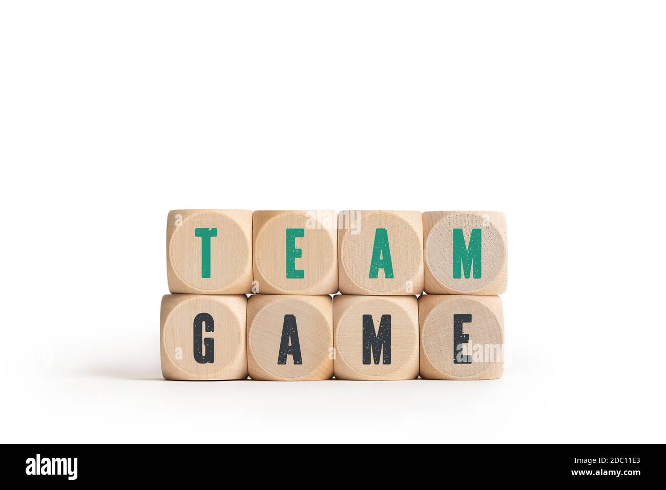 cubes showing the message "team game" on white background Stock Photo ...