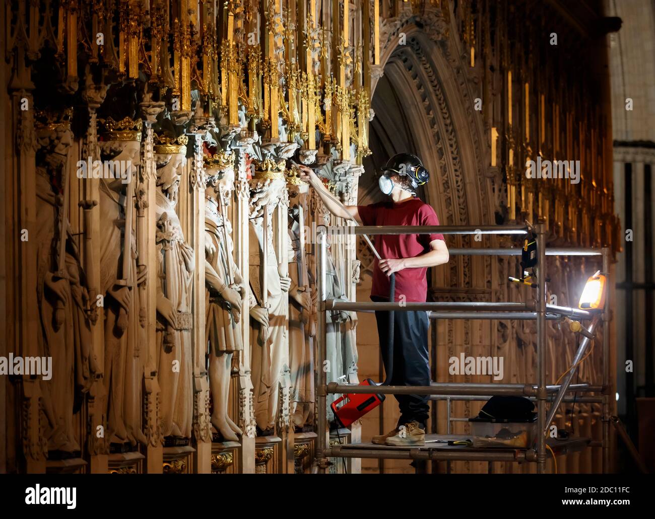 Lead Mason Conservator Lee Godfrey workers using museum grade vacuums ...