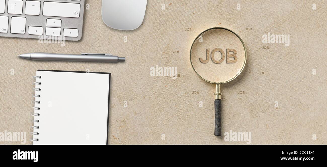 magnifying glass with the word JOB and office equipment on paper ...