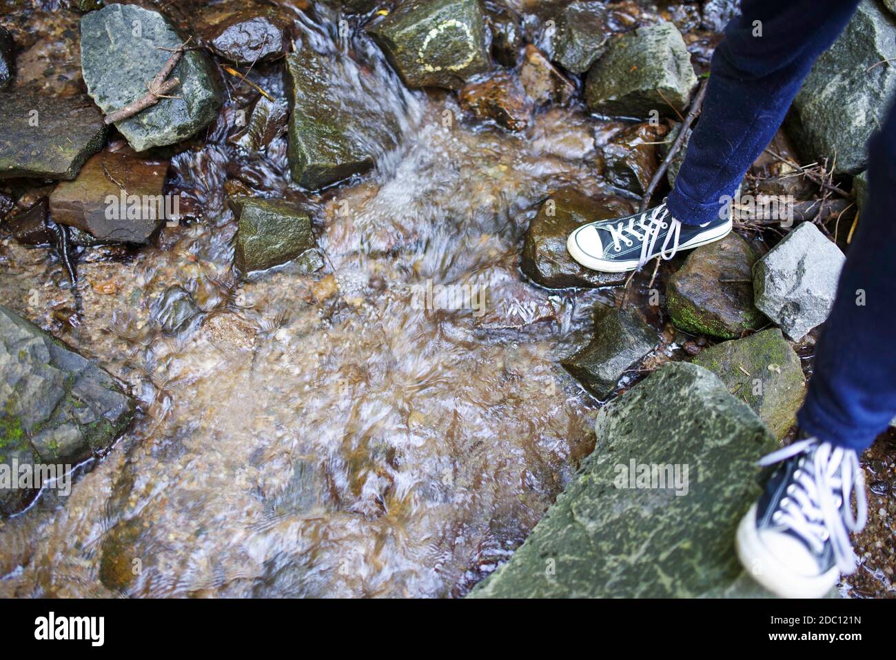 Stepping into creek hi-res stock photography and images - Alamy
