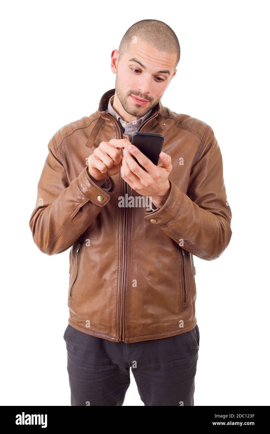 young casual man with a phone, isolated Stock Photo - Alamy