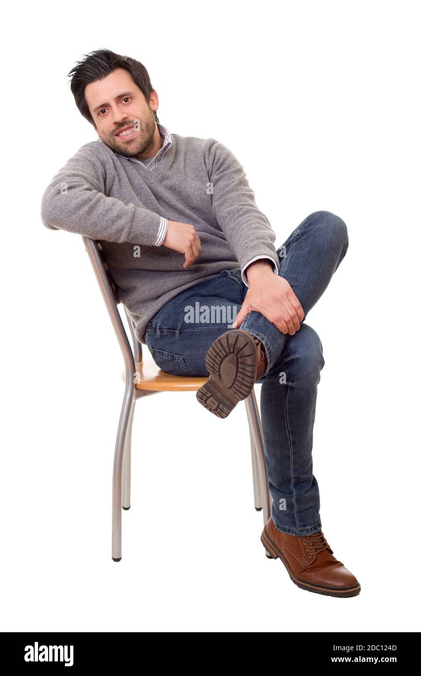 Man on a chair Cut Out Stock Images & Pictures - Alamy