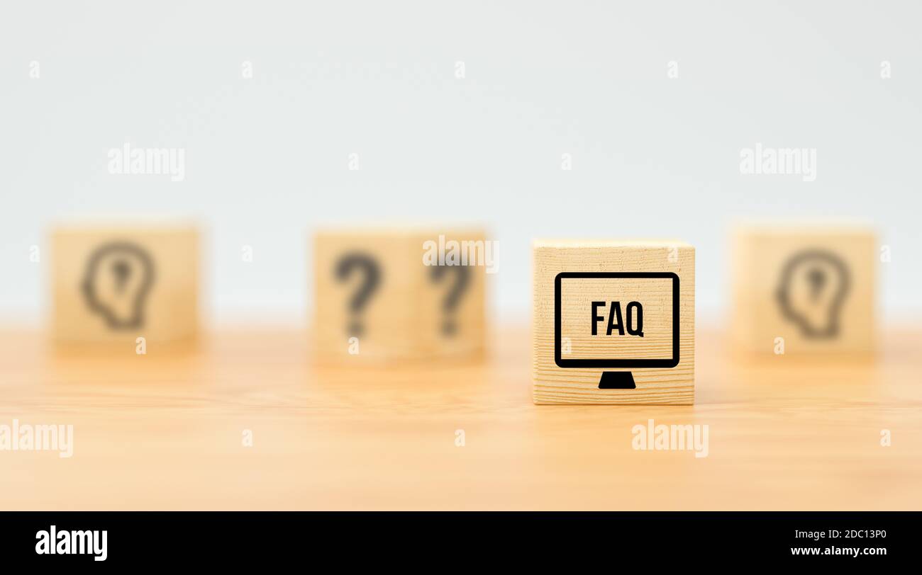 cubes with text FAQ on wooden surface and white background - 3d ...