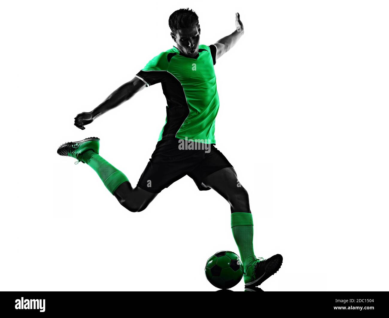 one young caucasian soccer player silhouette shadow in studio isolated ...