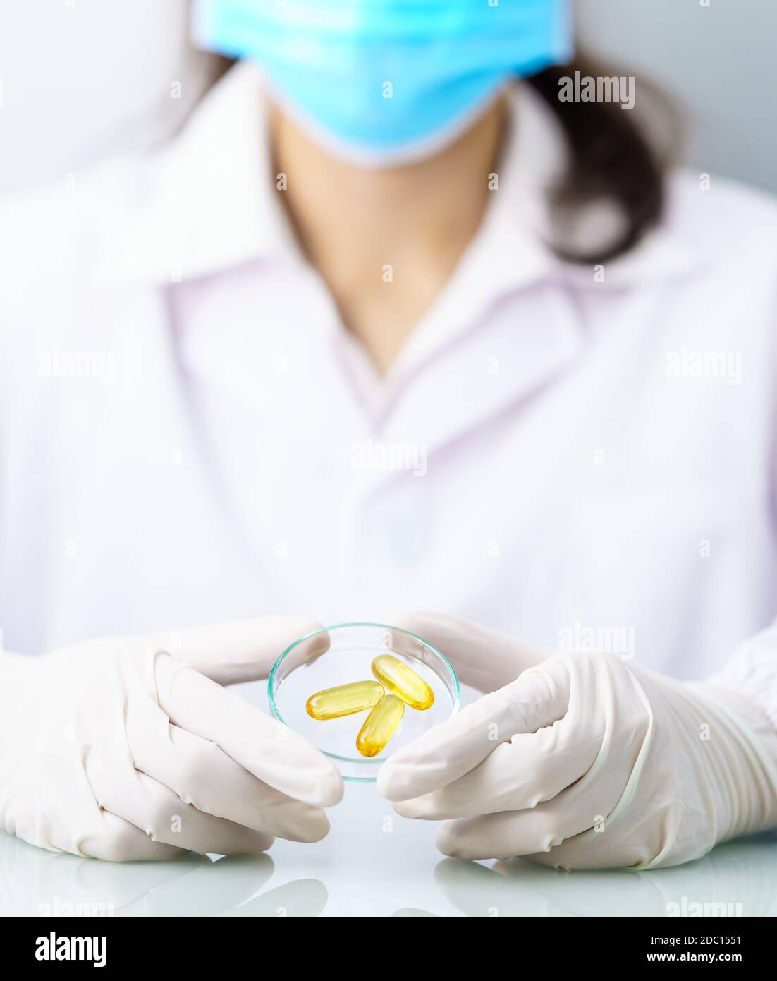 Close up Scientist hands putting in nitrile latex gloves holding Omega ...