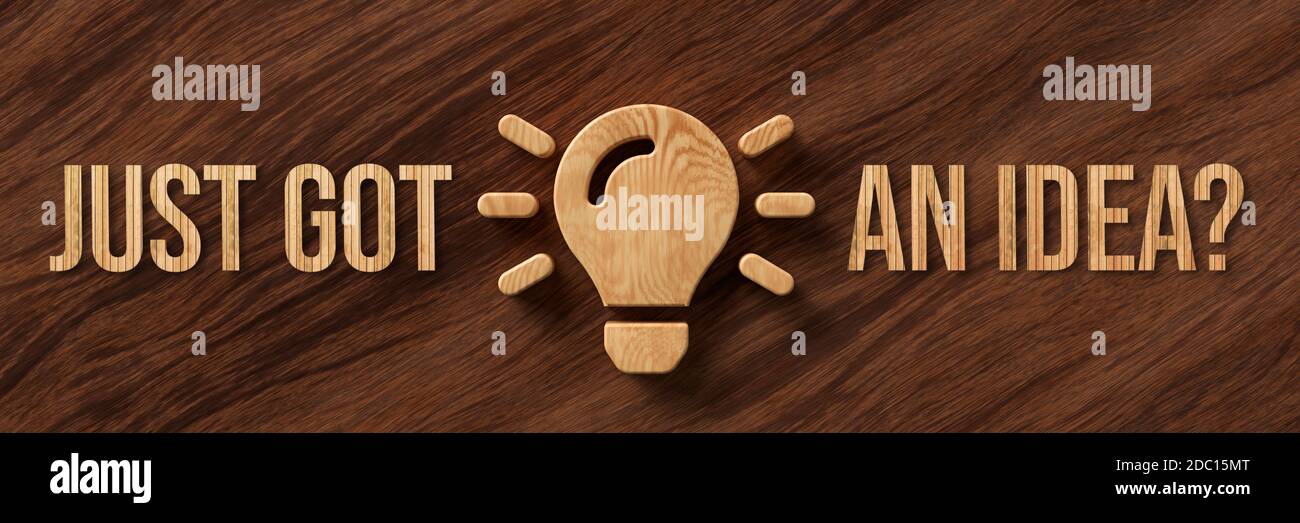 wooden lightbulb symbol and message JUST GOT AN IDEA? on wooden ...