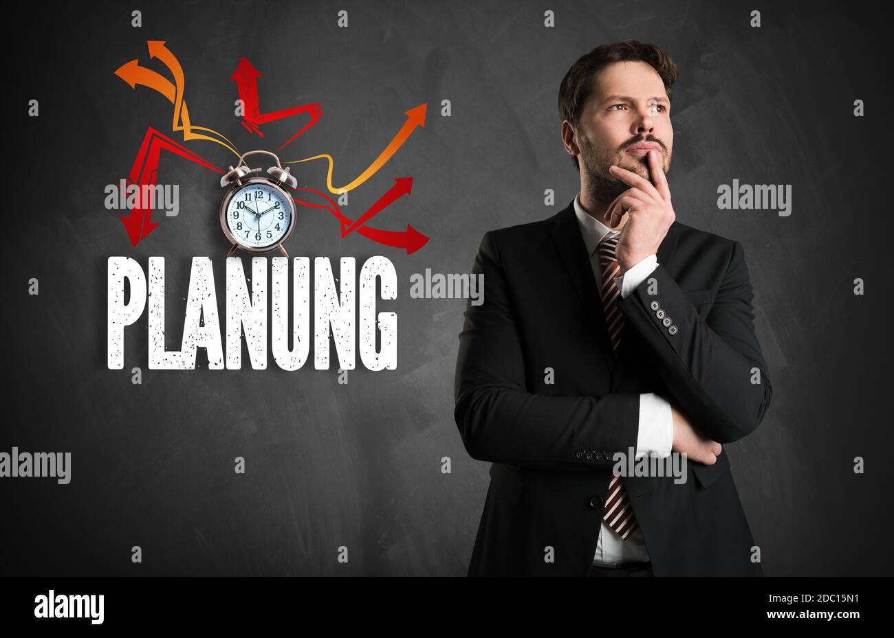 businessman thinking about something in front of a chalkboard with ...