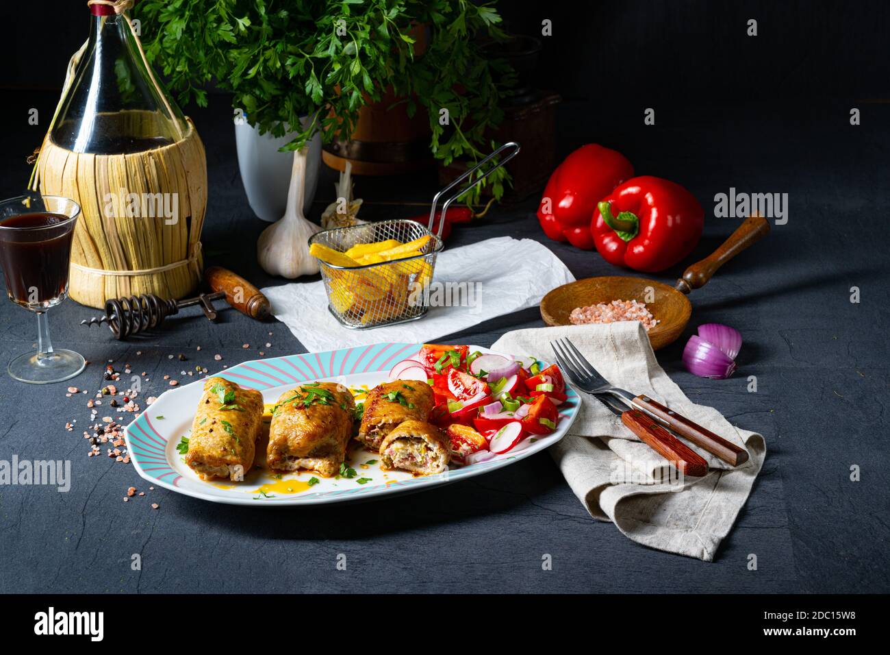 Vegetable roulade from roast pork loins with salads Stock Photo - Alamy