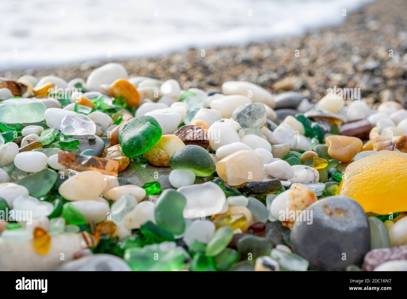 Glass and rocks moulded by the sea. High quality photo Stock Photo - Alamy