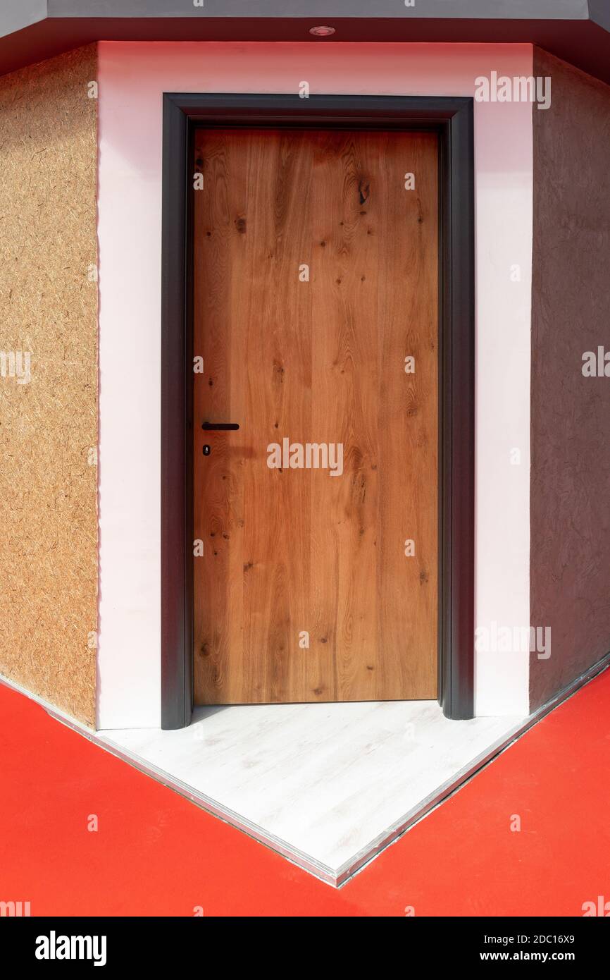 Wooden Door at House Building Corner Stock Photo - Alamy