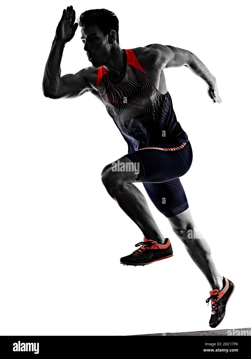 one young caucasian man practicing athletics runner running sprinter ...