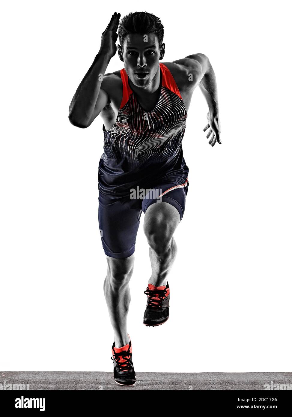 one young caucasian man practicing athletics runner running sprinter ...