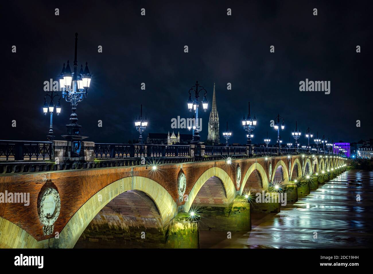 Pont de Pierre Bridge and cityscape of Bordeaux at night, France Stock ...