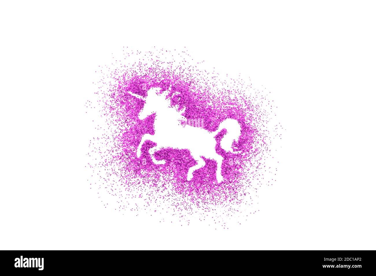 Unicorn shape on pink glitter over white background Stock Photo - Alamy
