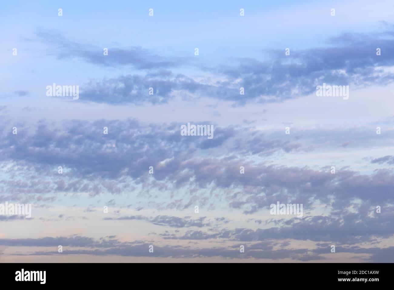 blue evening sky with spindrift clouds at September dusk Stock Photo ...
