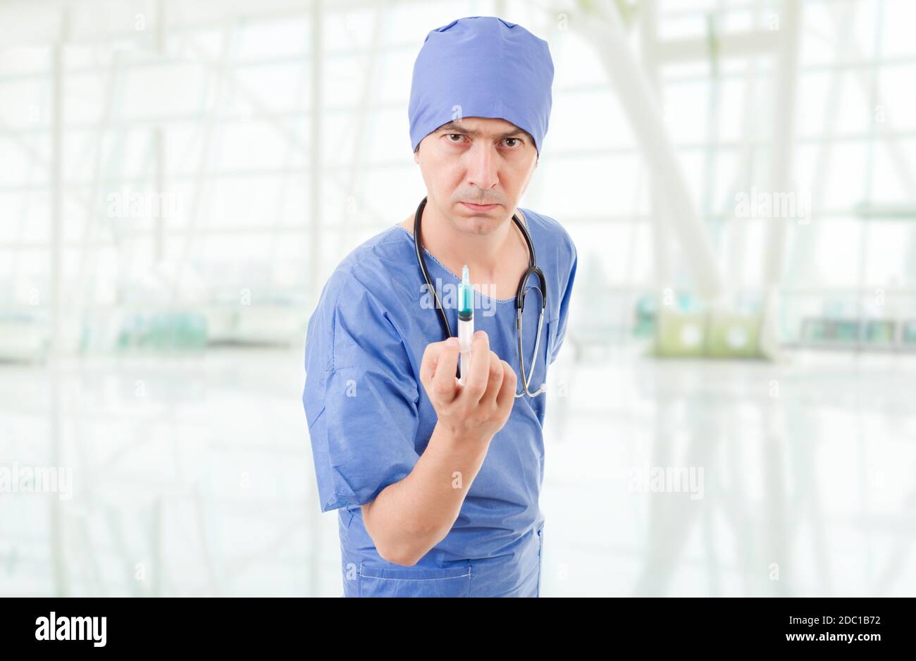 Mad doctor syringe hi-res stock photography and images - Alamy