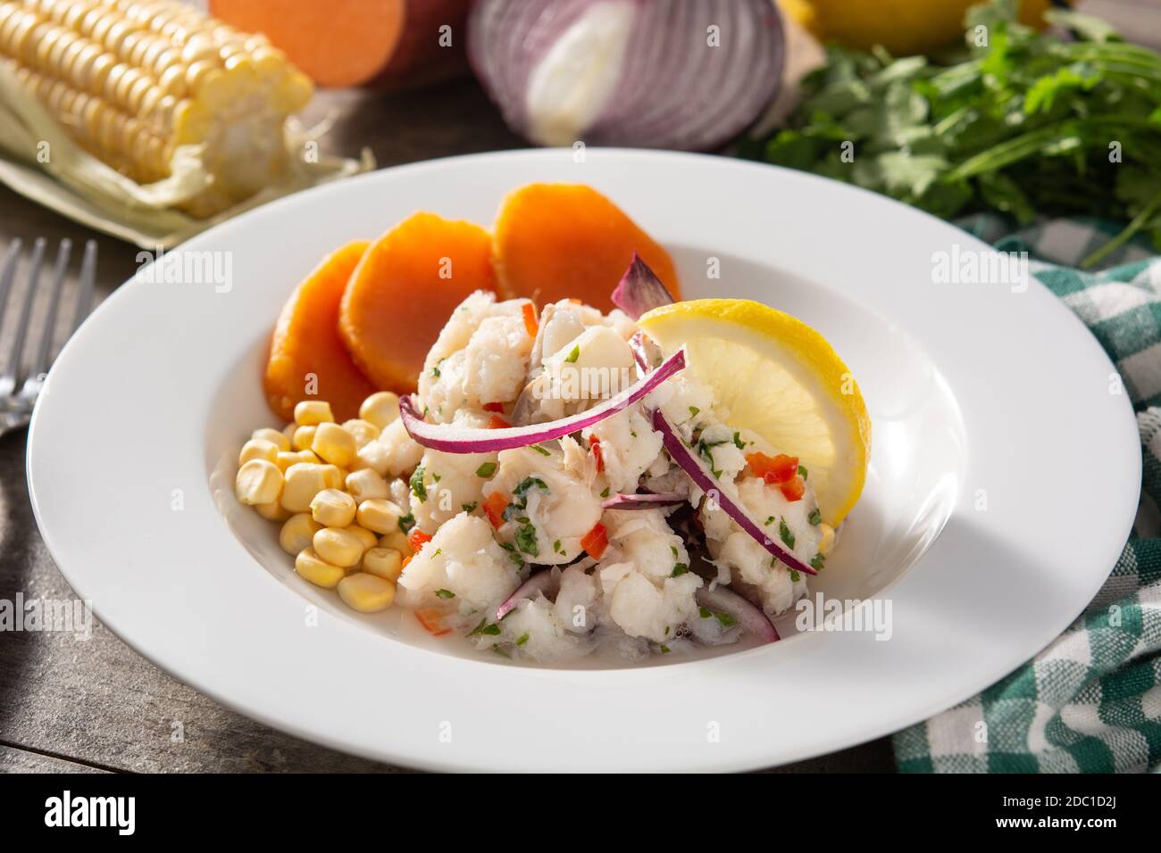 Traditional peruvian ceviche with fish, sweet potato, corn and ...