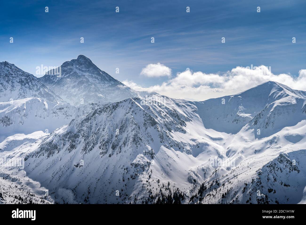 View from Kasprowy Wierch at Swinica mountain peak at winter. Amazing ...