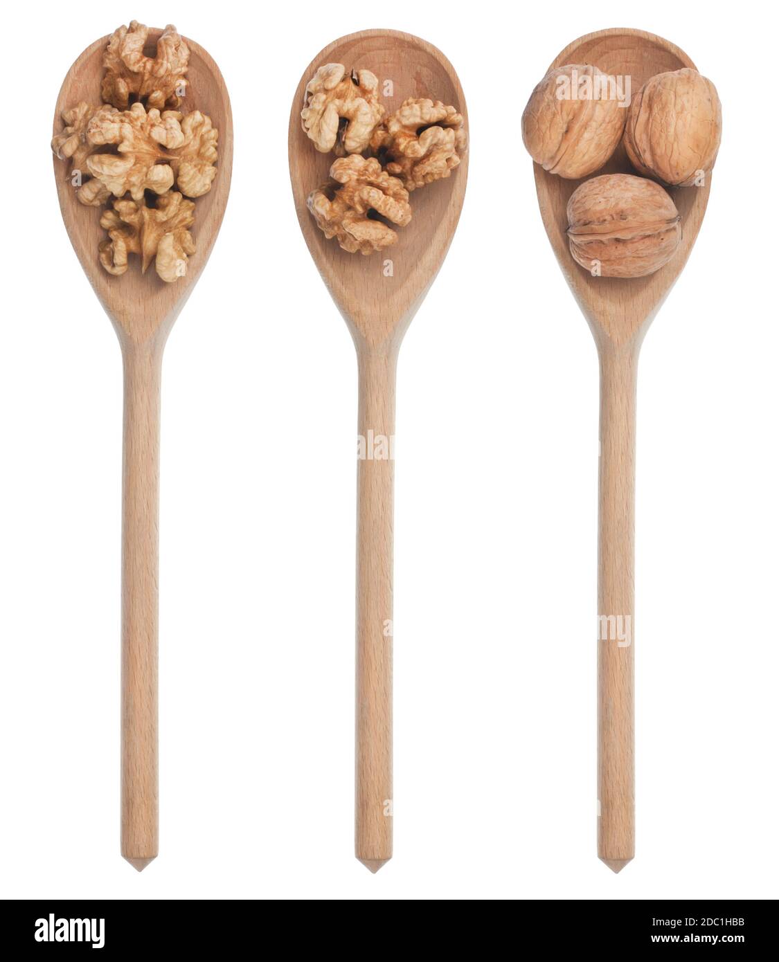 Three wooden spoons with walnut isolated on white background Stock ...