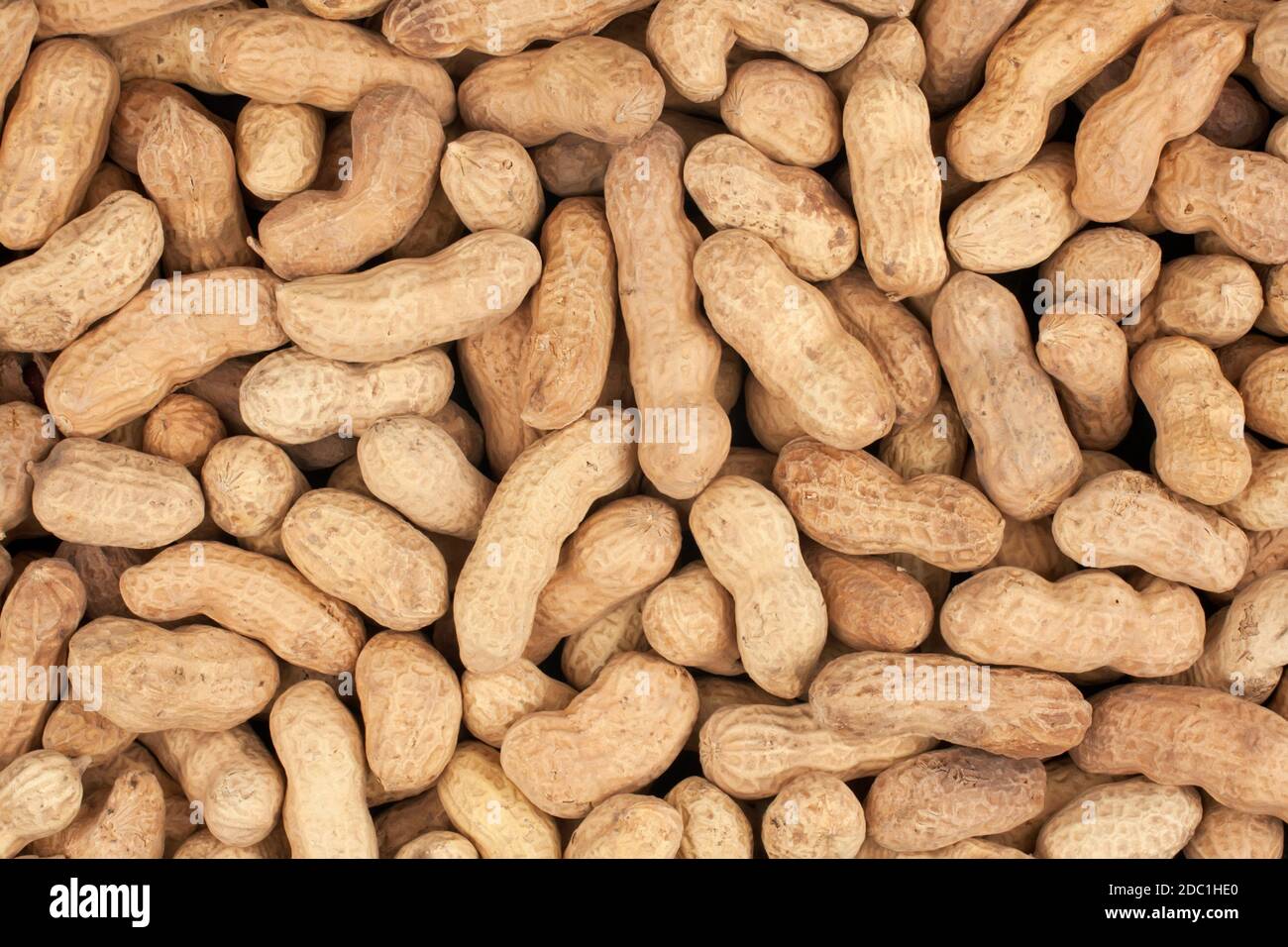 a bunch of peanuts can be used as background Stock Photo - Alamy