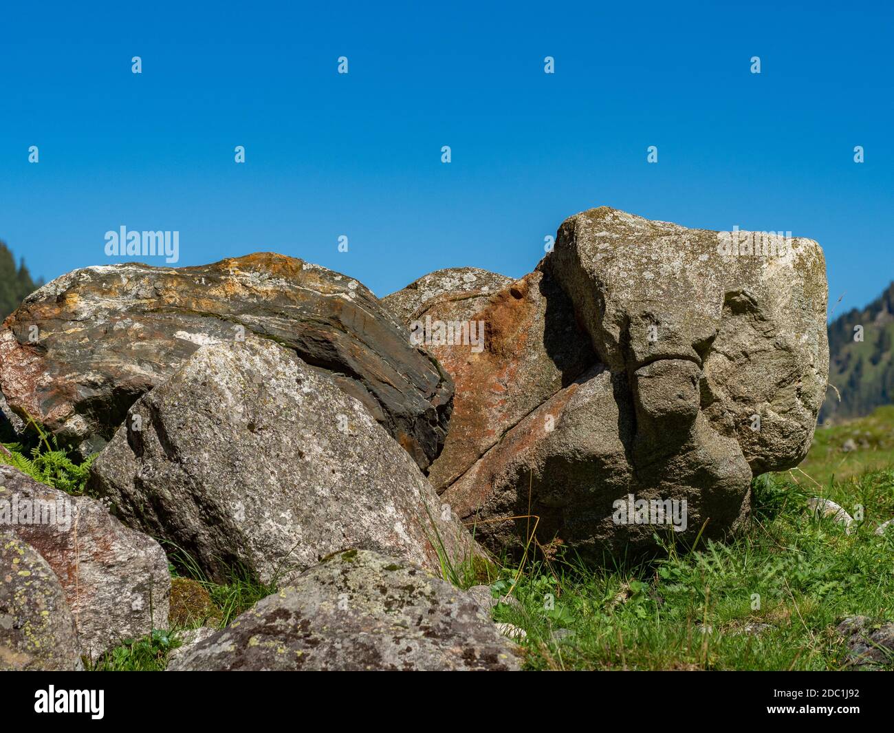Rock formation and blue sky in alps Stock Photo - Alamy