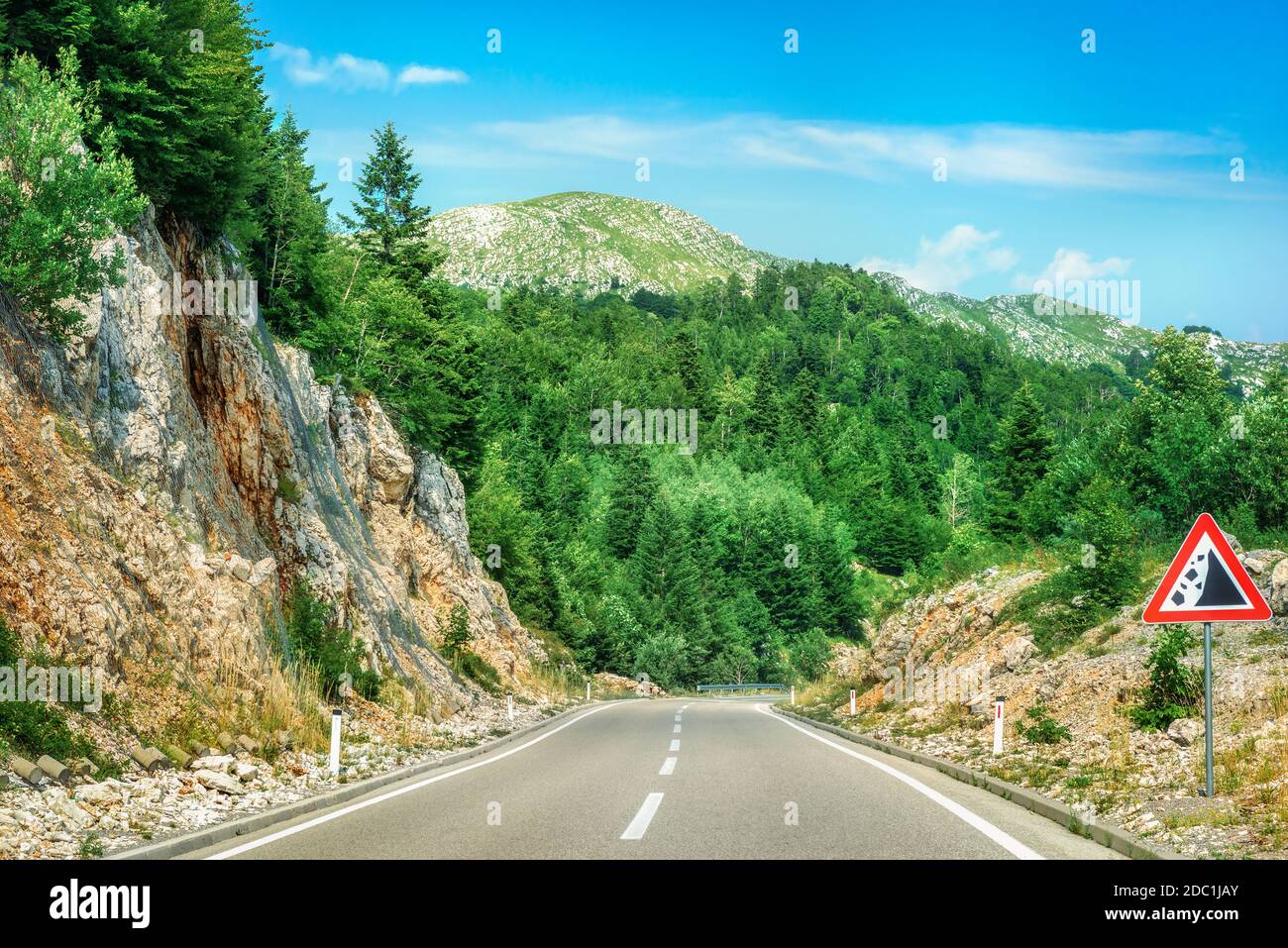Road sign in mountains of Montenegro at summer Stock Photo - Alamy