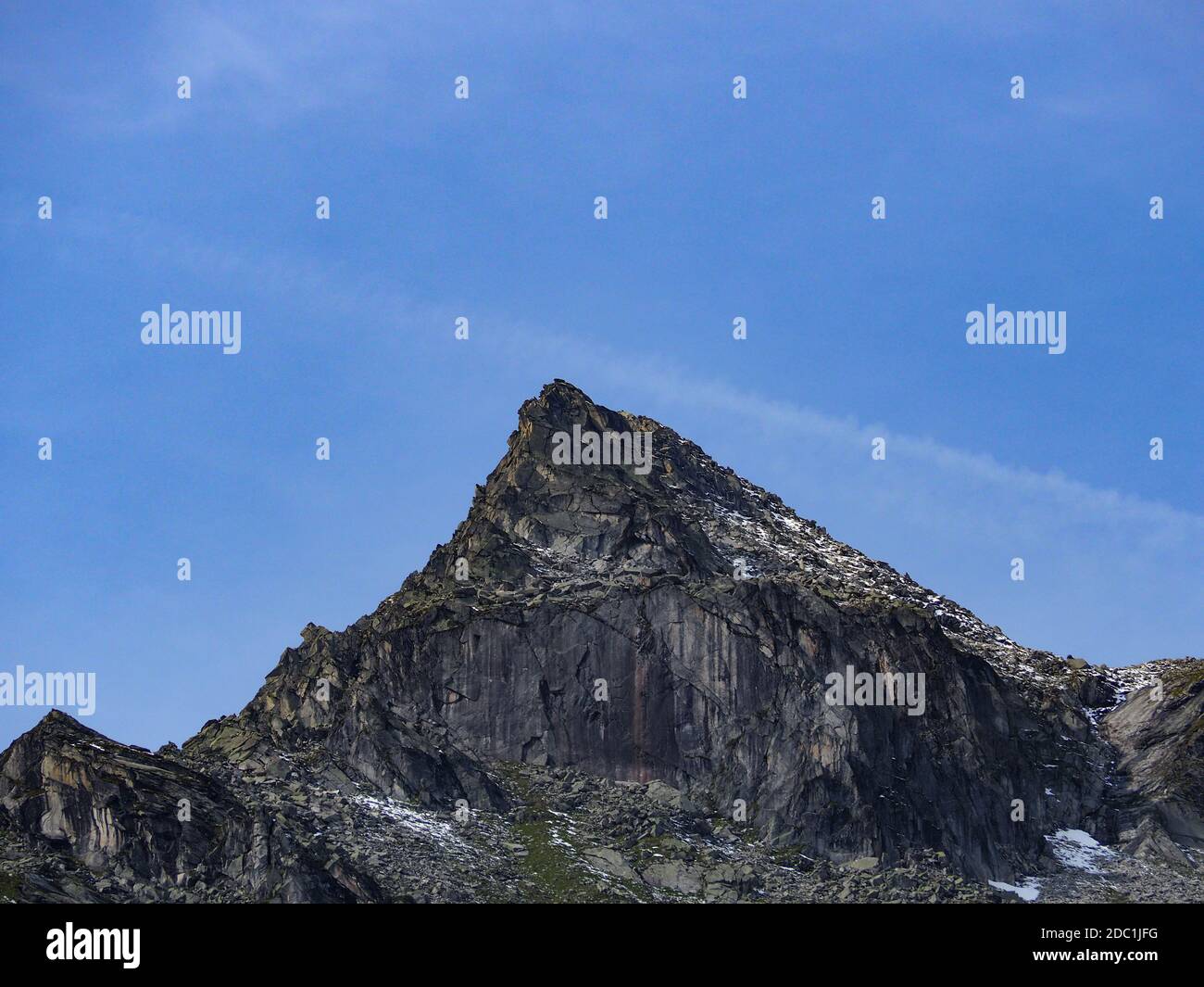 Peaks in the Alps and blue sky Stock Photo - Alamy