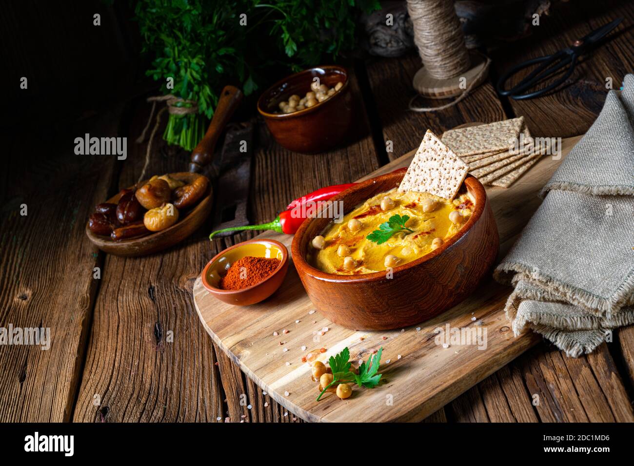 Delicious hummus paste with lemon and chilli Stock Photo - Alamy