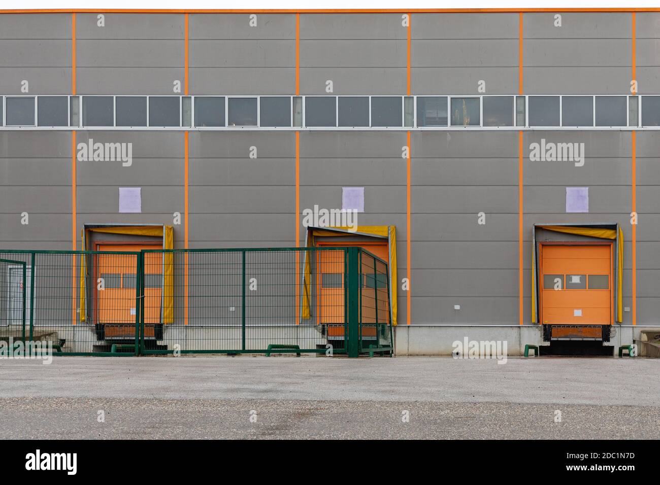 Loading Dock Cargo Doors at Distribution Warehouse Stock Photo - Alamy