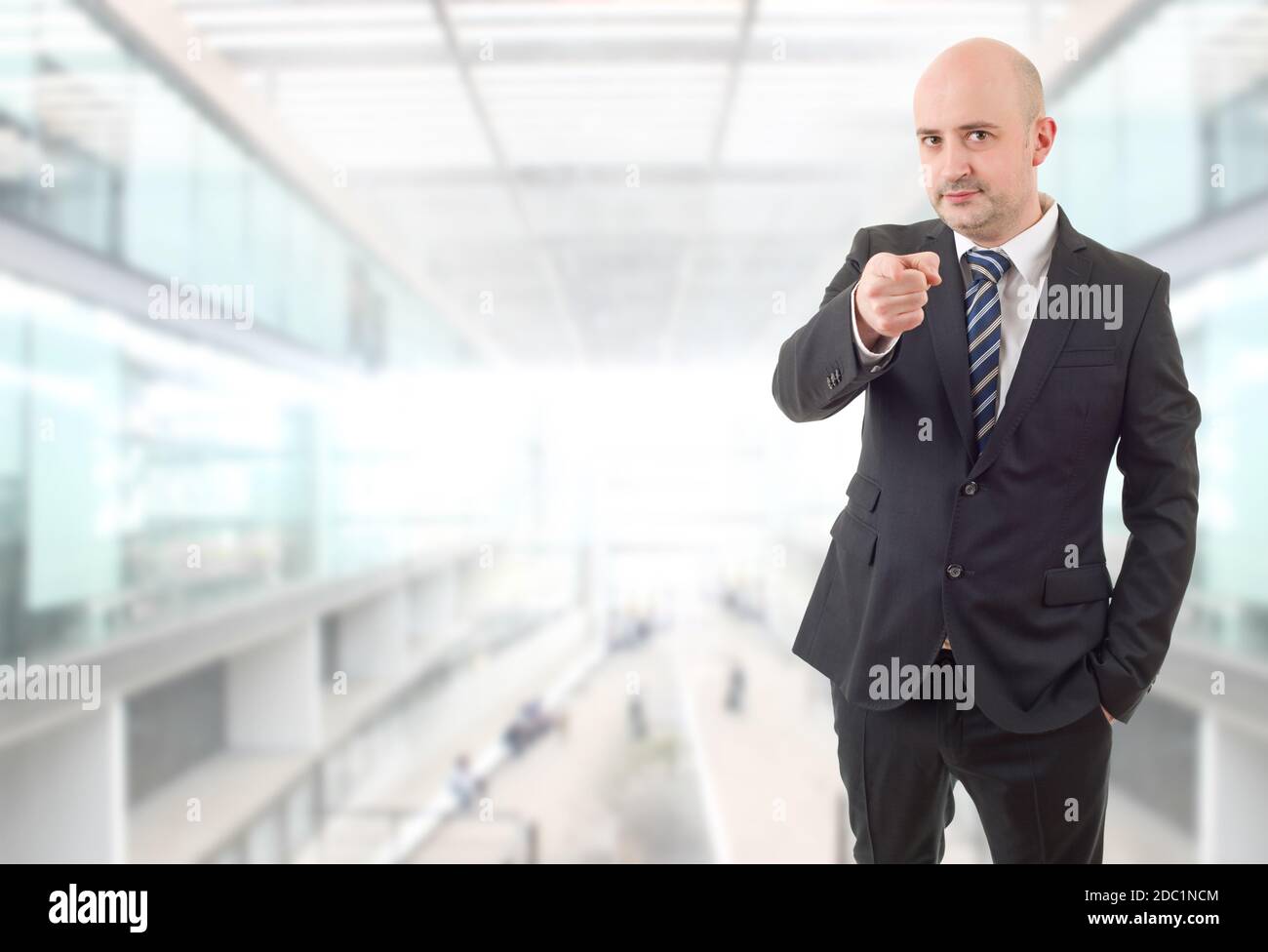 mad business man pointing, at the office Stock Photo - Alamy