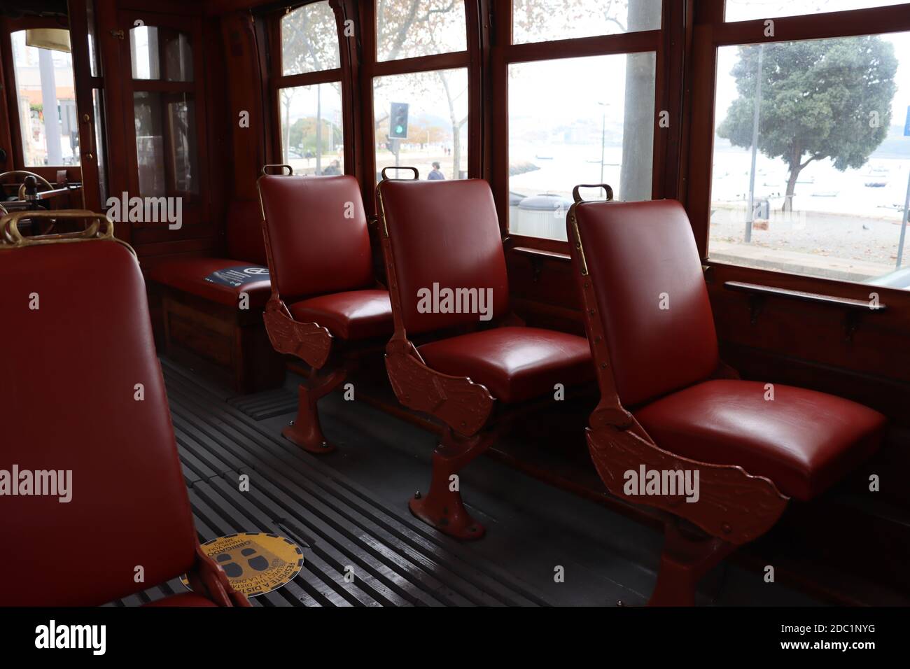 Empty seats on heritage tram 10 in Porto, Portugal Stock Photo - Alamy