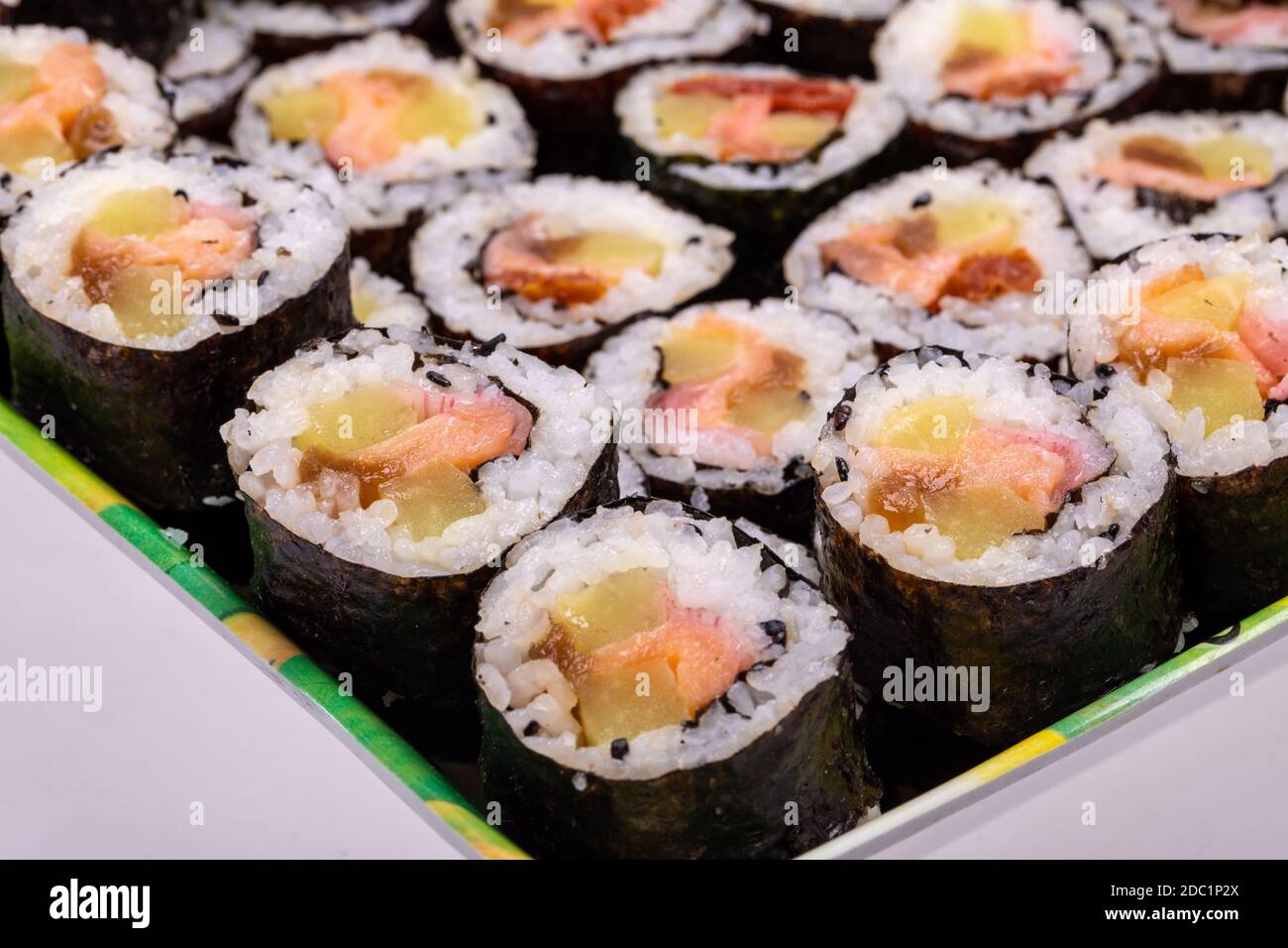Top view of stack of Japanese sushi maki roll plate. Served in Japanese ...