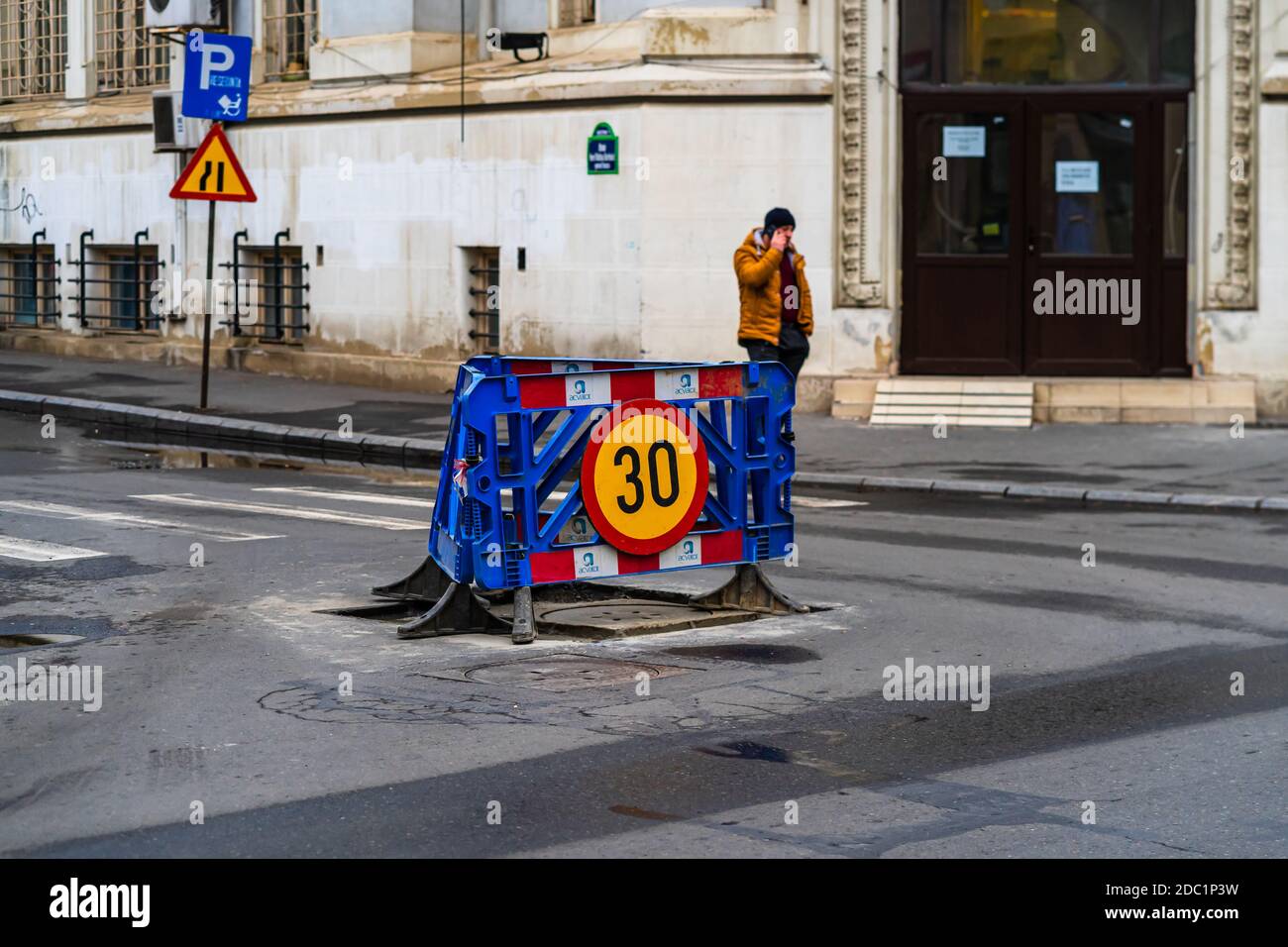 Speed limit, warning road signs located in working area. Bucharest ...