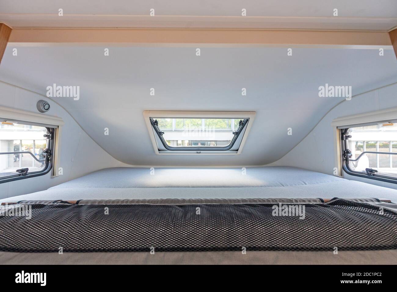 Big Bed in Mobile Home Camper Bedroom Stock Photo - Alamy