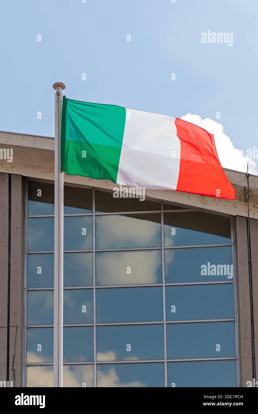 Italian National Flag Tricolor in Front of Building Stock Photo - Alamy