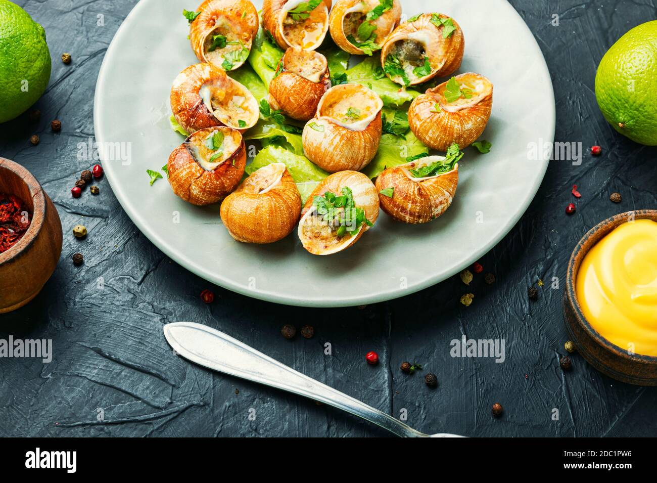Escargots or snail with garlic butter and lime.French and Italian ...