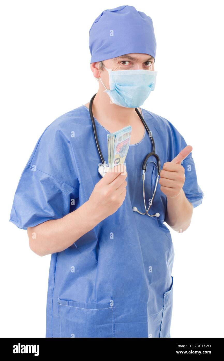 Happy male doctor holding bank notes, isolated Stock Photo - Alamy