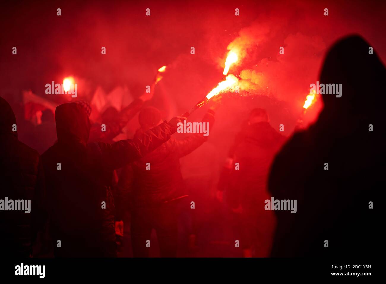 flaming red flare during a street protest in the city Stock Photo - Alamy