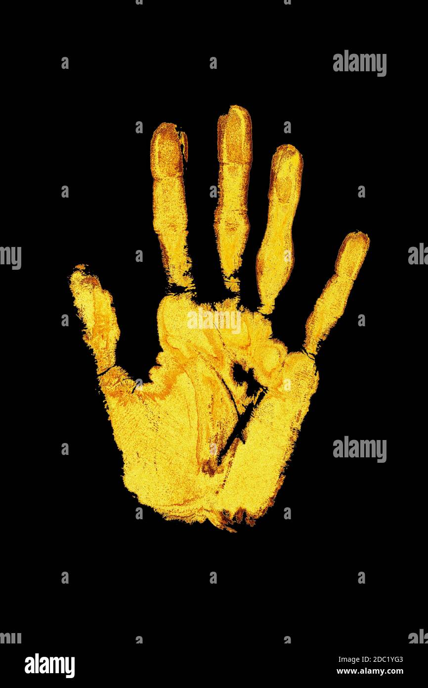 Golden human hand print black background isolated close up, shiny gold ...