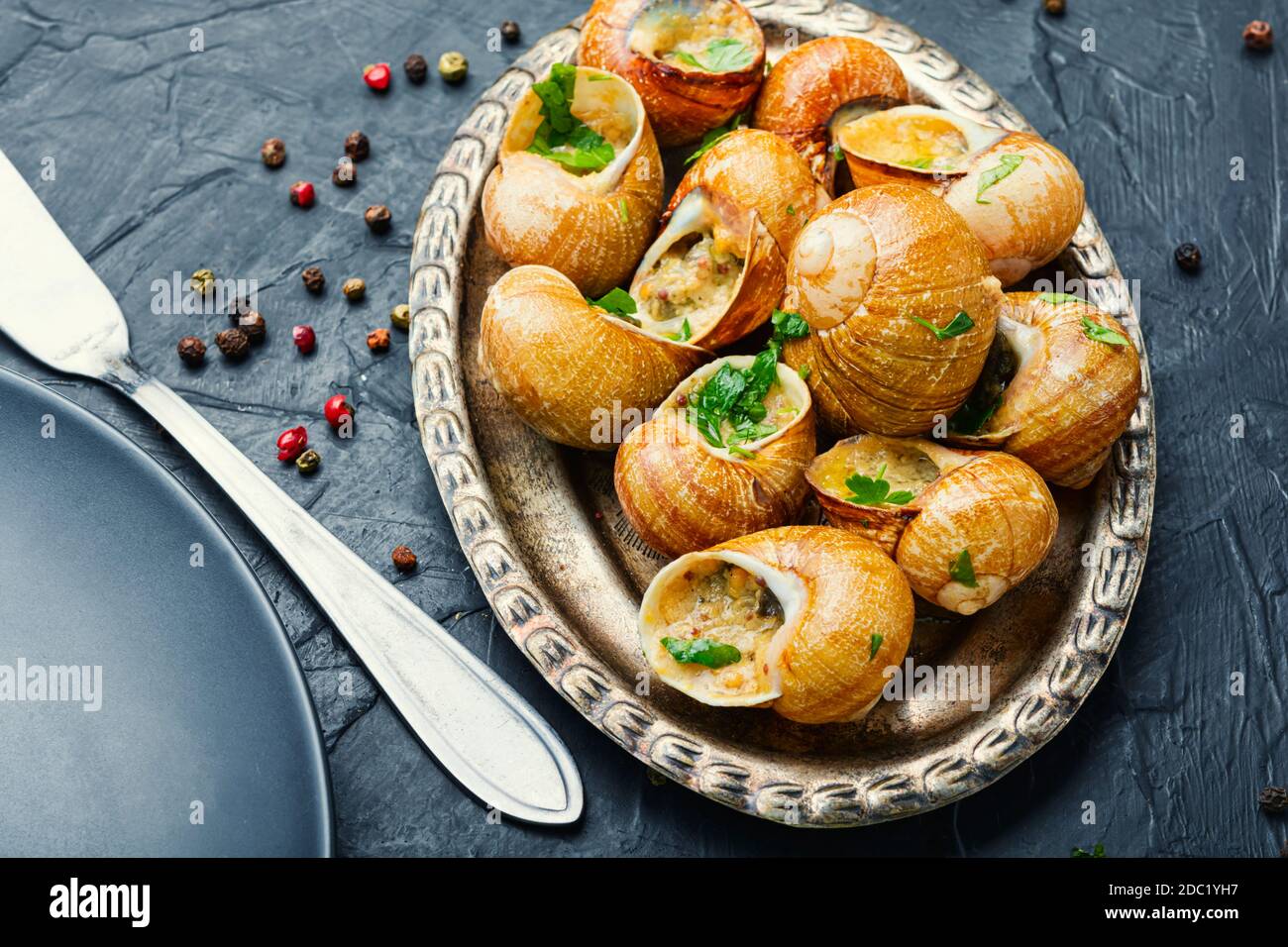 Baked snails garlic butter parsley hi-res stock photography and images ...