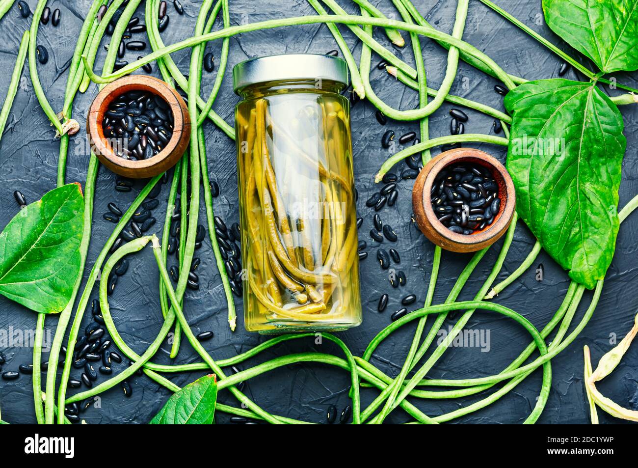 Cowpea pods with beans and a jar of canned cowpea.Vegetable plant Stock ...