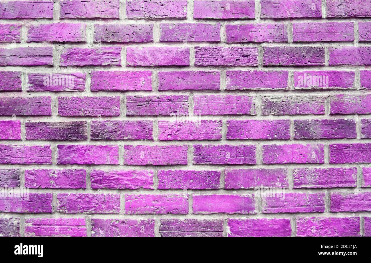 Stone brick wall pink background Stock Photo - Alamy