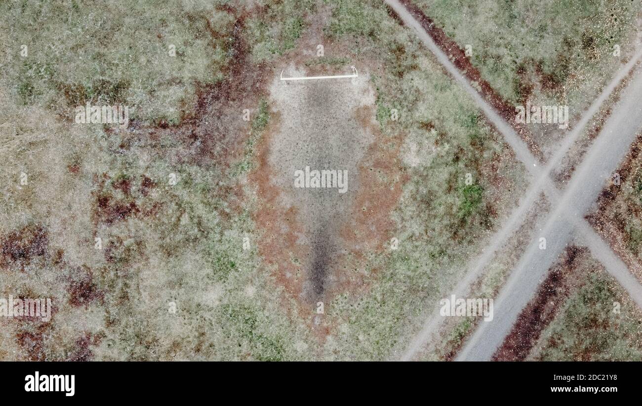 Old football pitch at the beginning of autumn with moody feel Stock ...