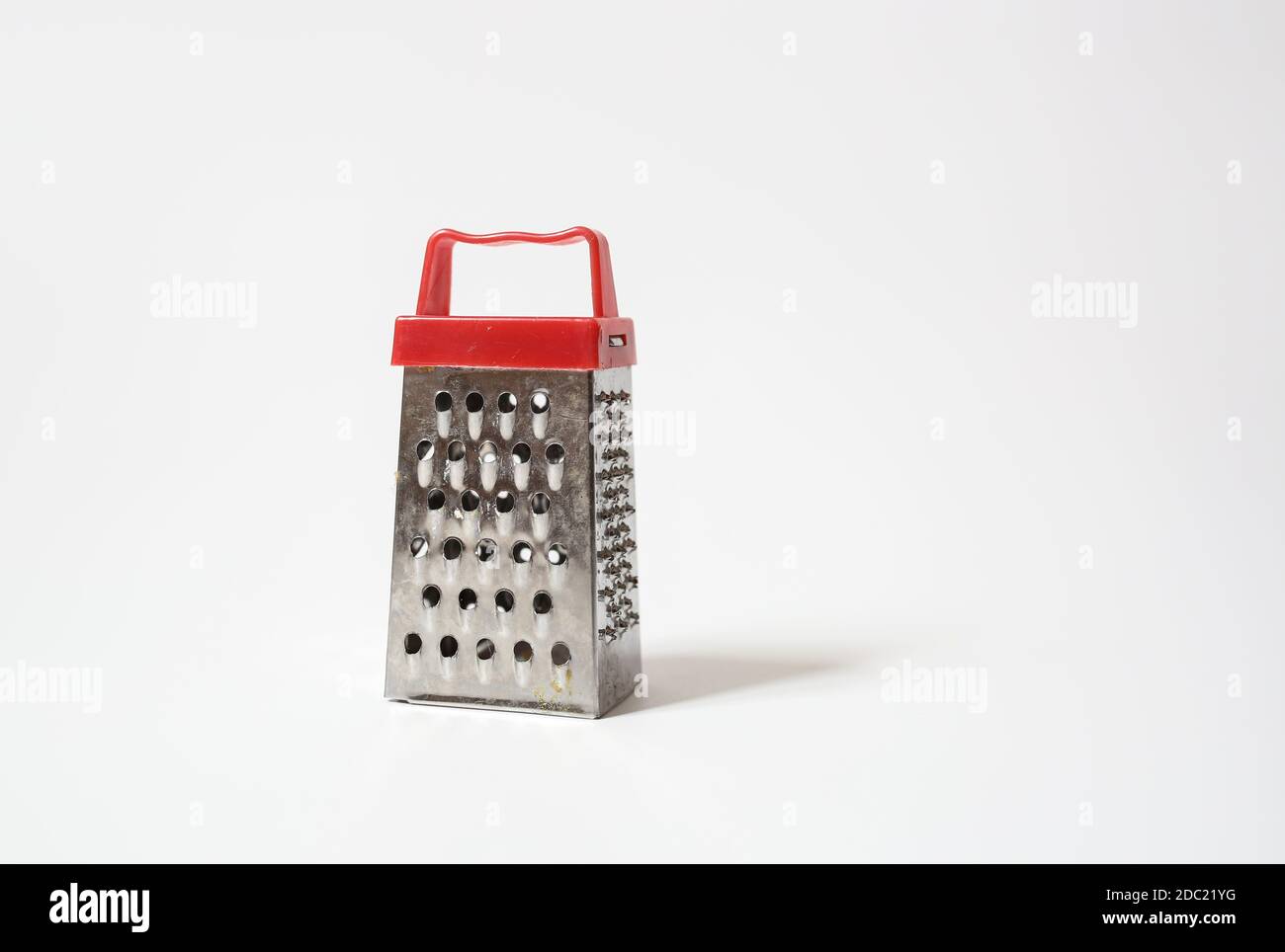 Stainless steel box grater with handle well used for grating cheese and ...