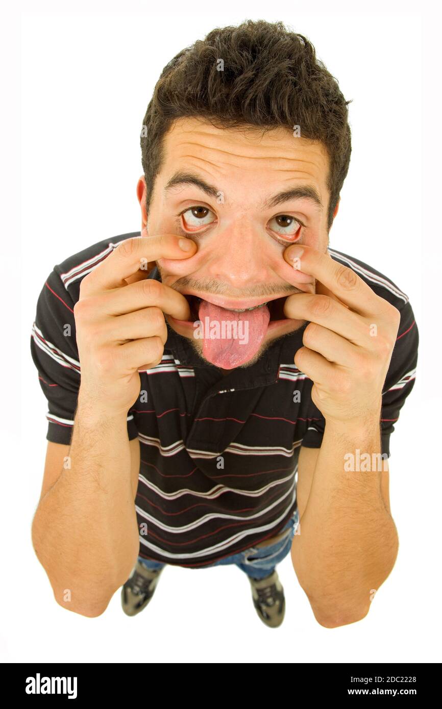 young casual silly man portrait in a white background Stock Photo - Alamy