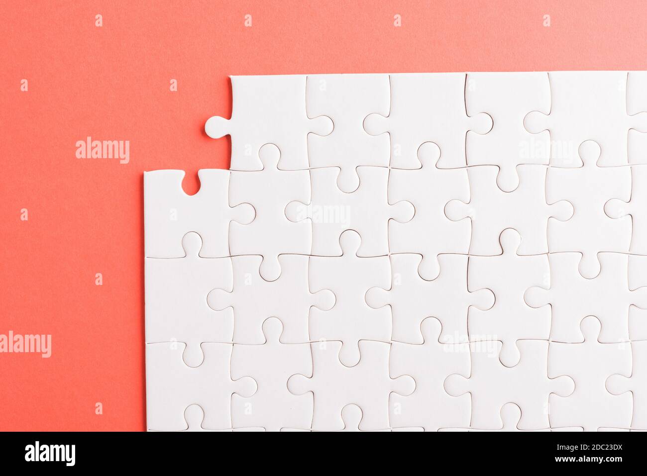 Top view flat lay of paper plain white jigsaw puzzle game texture last ...