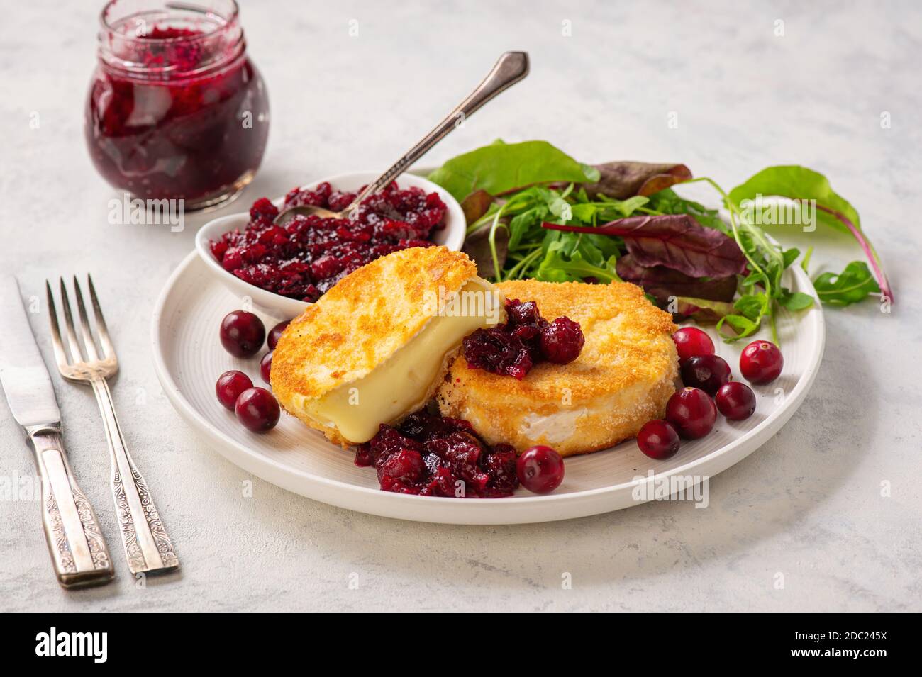 Fried camembert cheese and cranberry sauce Stock Photo - Alamy
