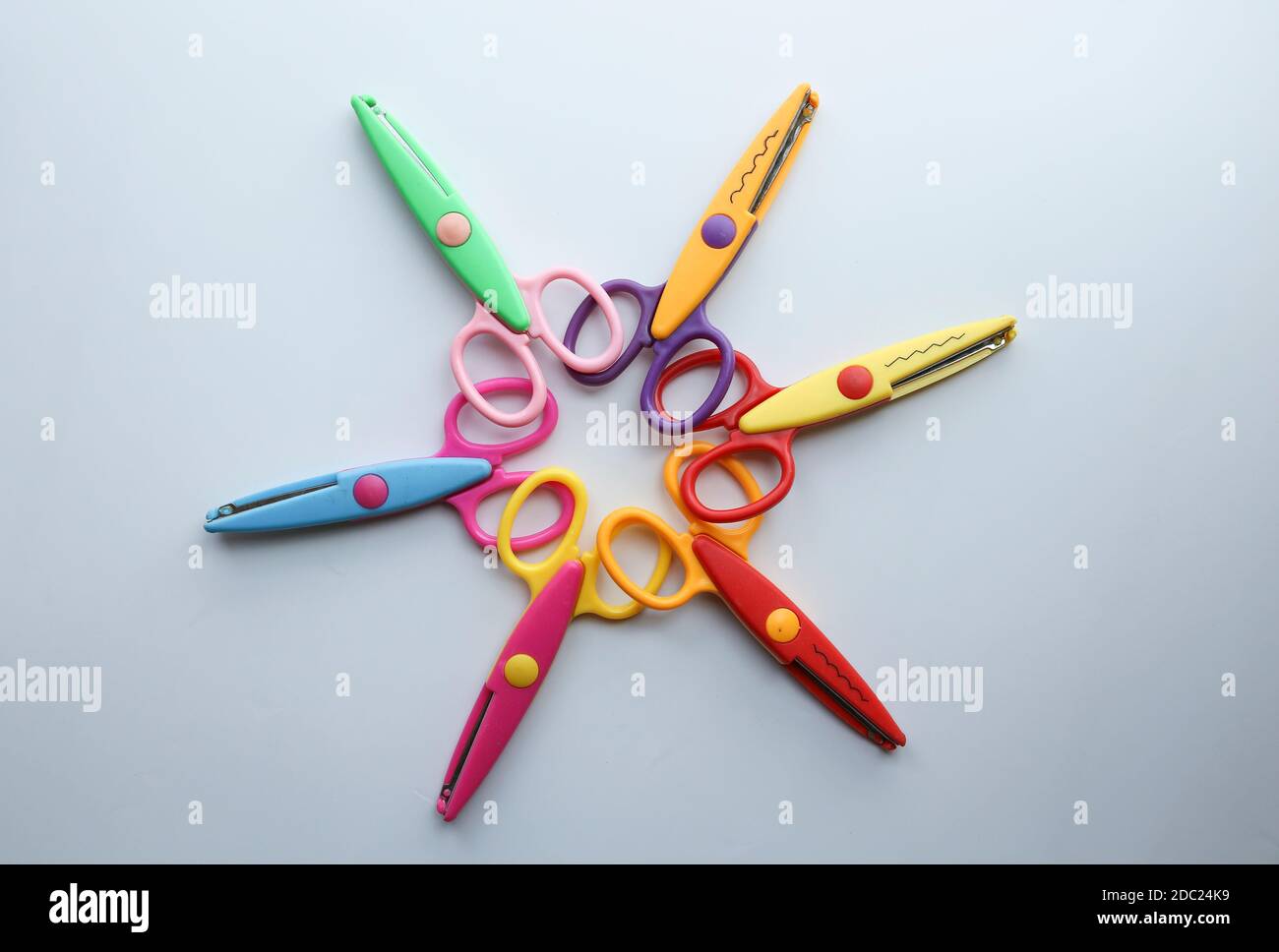 Colorful scissors isolated on a white background Stock Photo - Alamy