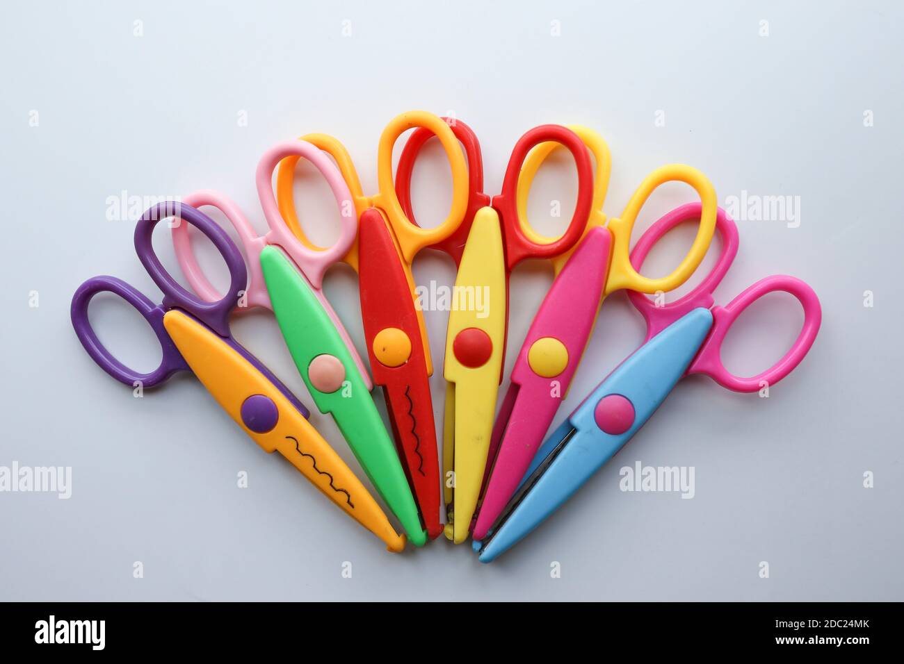 Colorful scissors isolated on a white background Stock Photo - Alamy