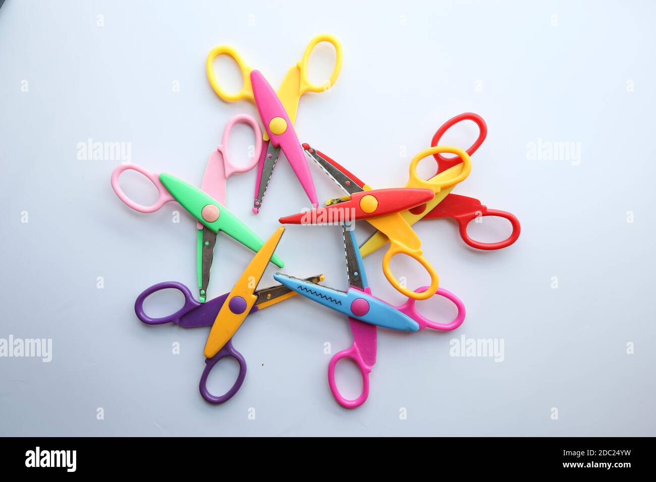 Colorful scissors isolated on a white background Stock Photo - Alamy